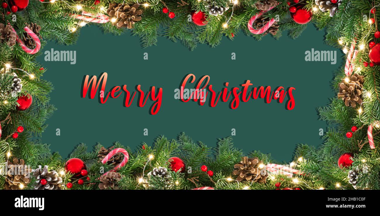 Christmas decorated garland frame Stock Photo - Alamy