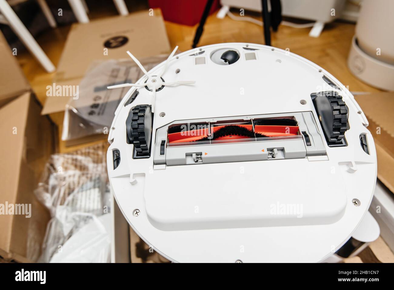 Unboxing process of new robotic vacuum cleaner robovac Stock Photo - Alamy