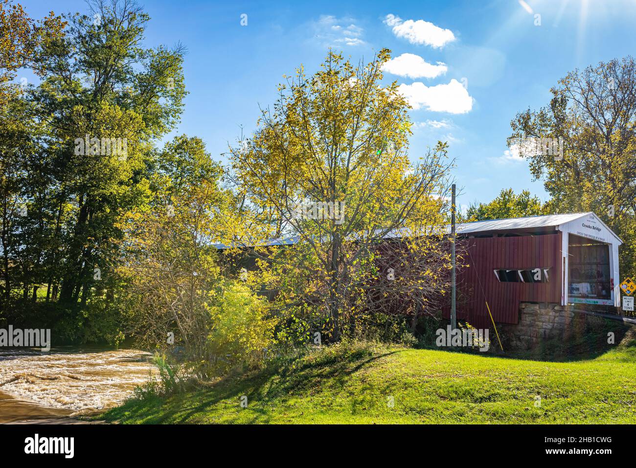 The Crooks Covered Bridge crosses Little Raccoon Creek during Autumn ...