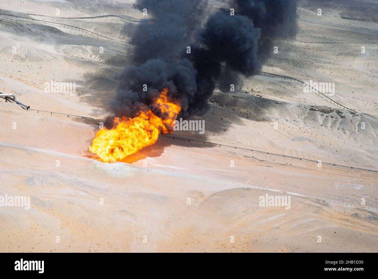 Oil industry in Ras Tanura area, Saudi Arabia, flare fire smoke in ...