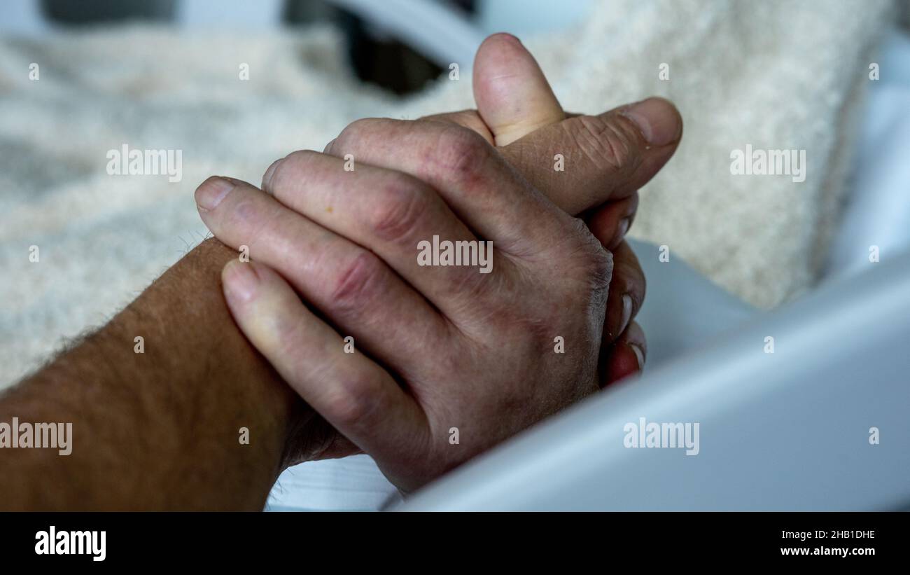 Clutched hands hi-res stock photography and images - Alamy