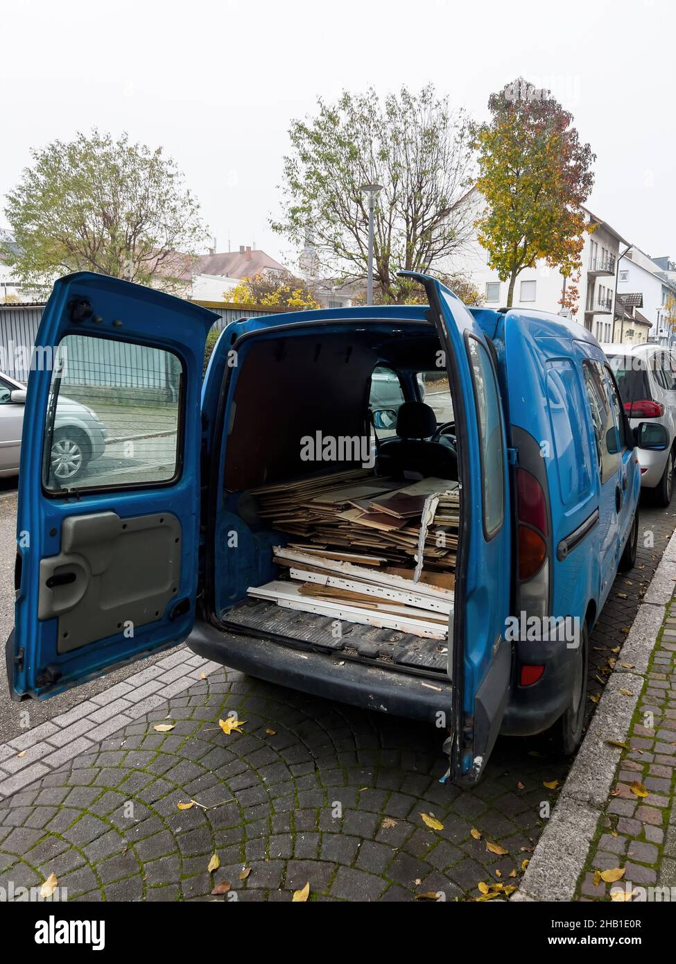 Rear view of open van doors with multiple wooden placards Stock Photo ...