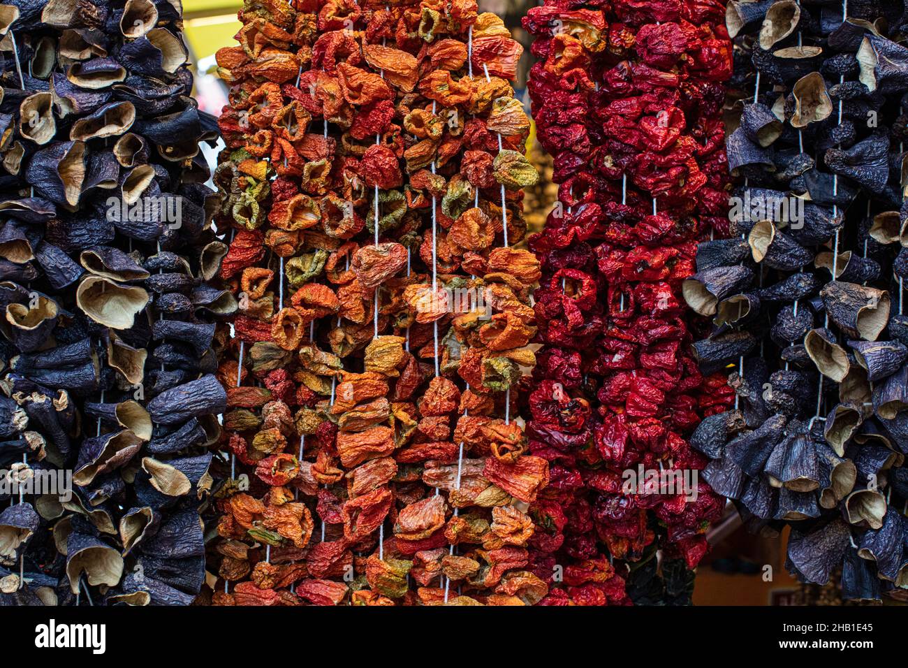 Dried vegetables in the traditional way strung on threads and hung on ...