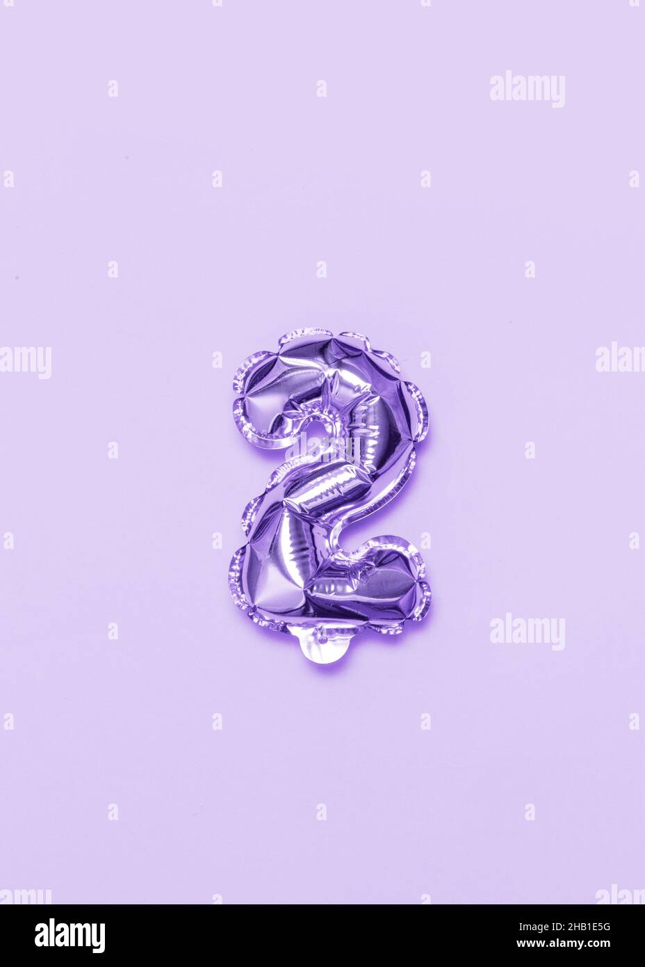 2. Foil Very peri color balloon number two isolated on purple ...