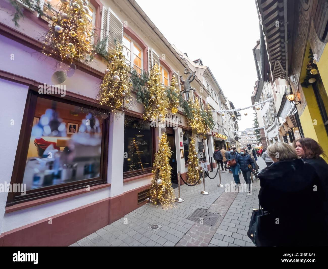 Senior women wearing respiratory face masks against COVID-19 disease ...