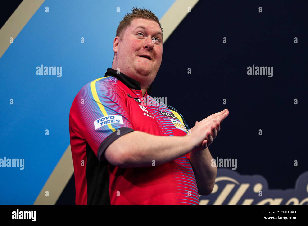 Ricky Evans rubs his hands together before his match during day two of ...