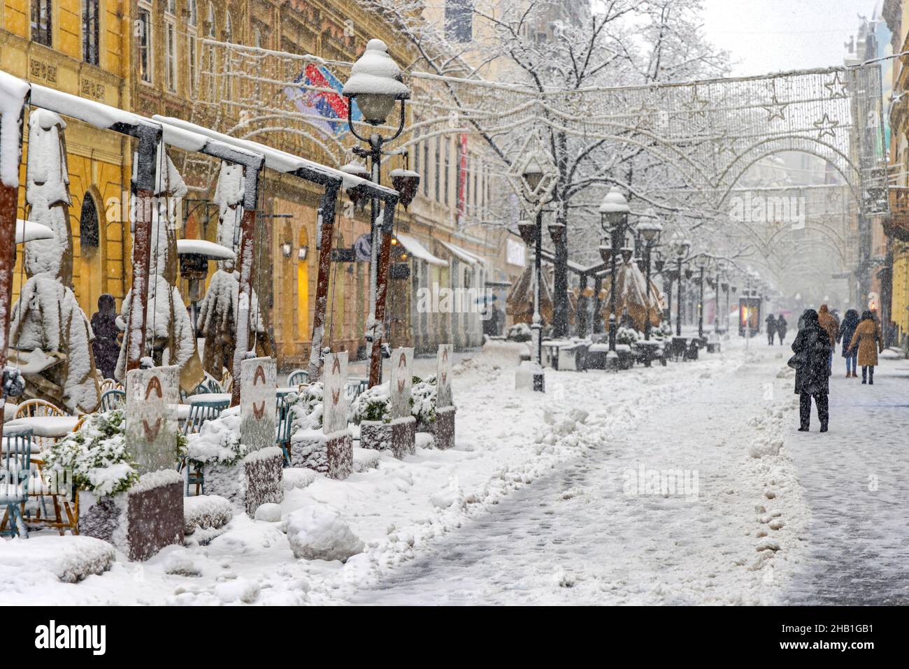 Pedestrian Street Covered With Snow at Cold Winter in City Stock Photo ...