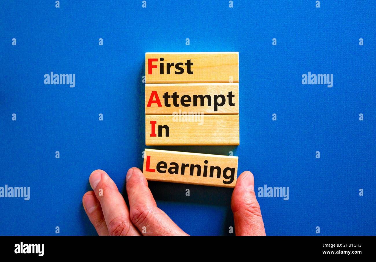 FAIL first attempt in learning symbol. Wooden blocks with words FAIL ...