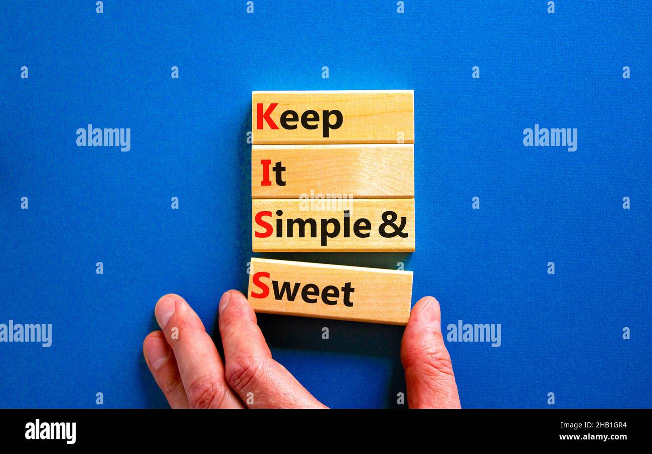 KISS keep it simple and sweet symbol. Concept words KISS keep it simple and sweet wooden blocks ...