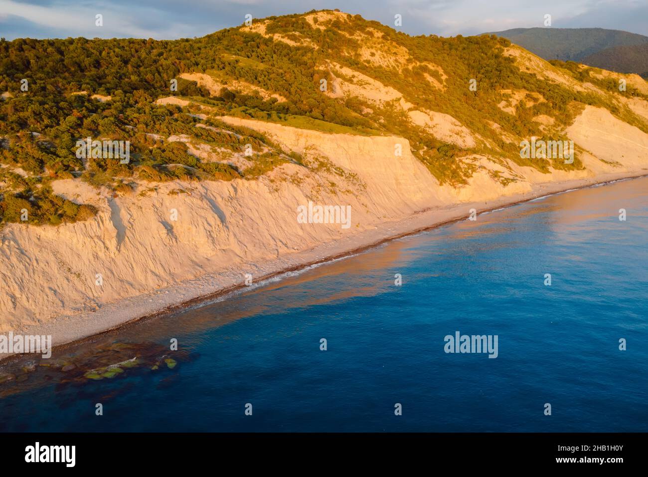 Aerial view of sea coastline and cliff with sunset colors Stock Photo ...
