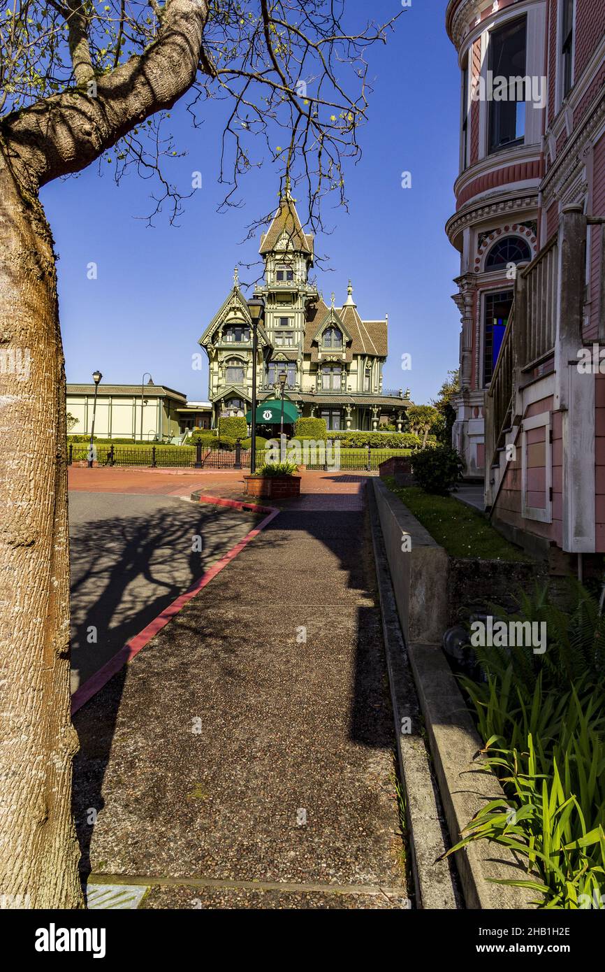Vertical shot of historic Victorian Carson Mansion against a clear blue ...