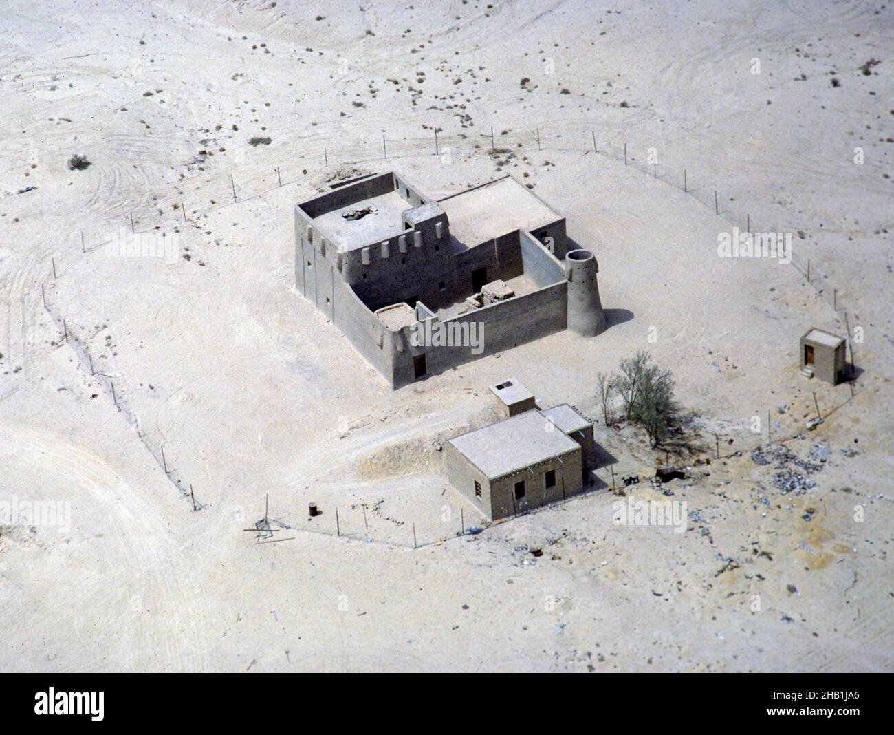 Traditional adobe mud house and compound in desert, Saudi Arabia 1979 ...