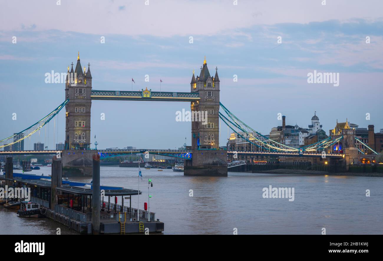 A night time view along the River Thames, from Sugar Quay, of Tower ...