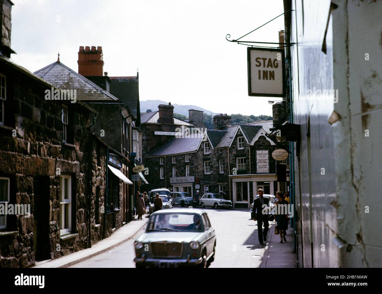People and cars by the Stag Inn, Bridge Street, Dolgellau ...