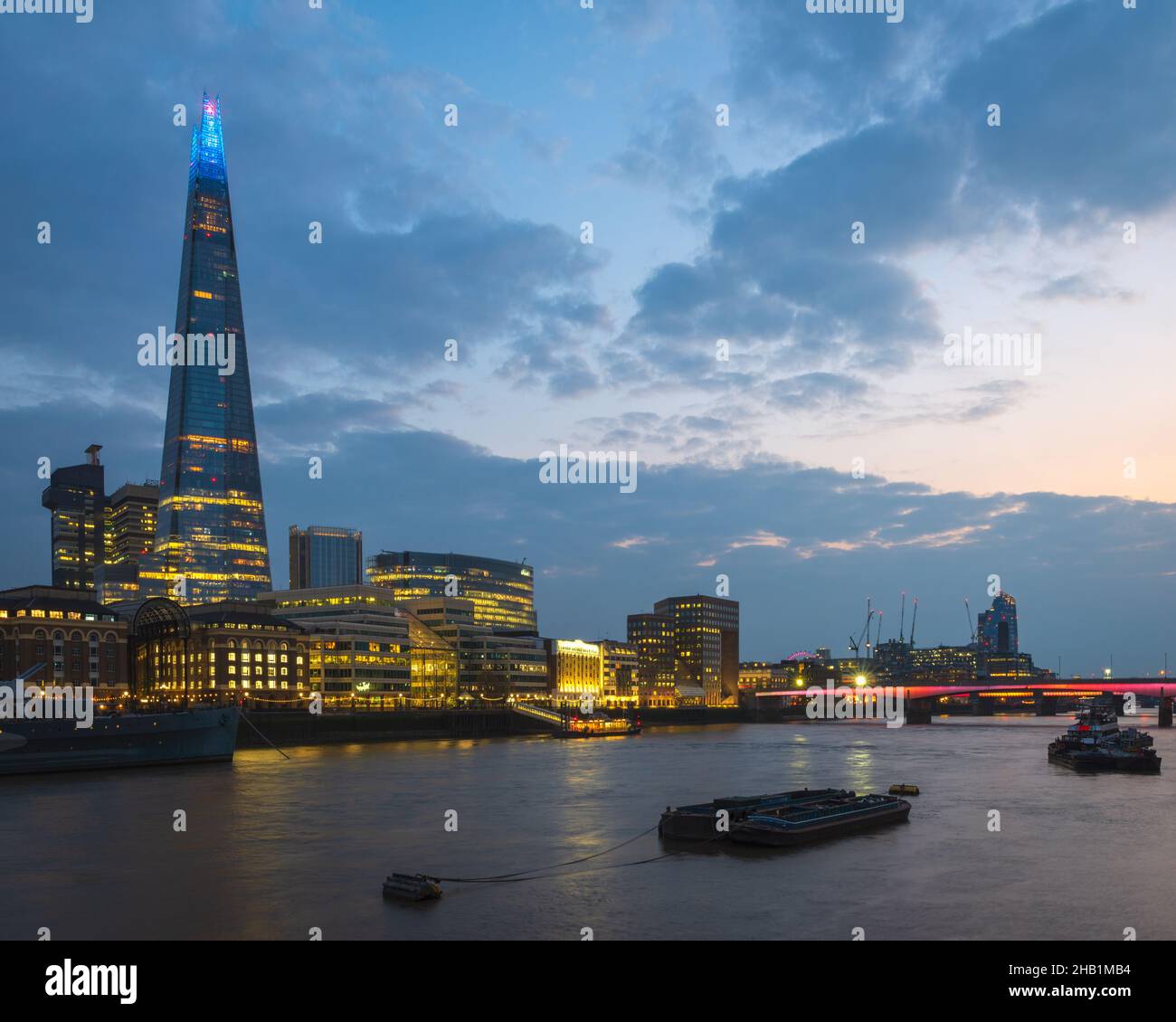 A night time view across the River Thames, from Sugar Quay, of The ...