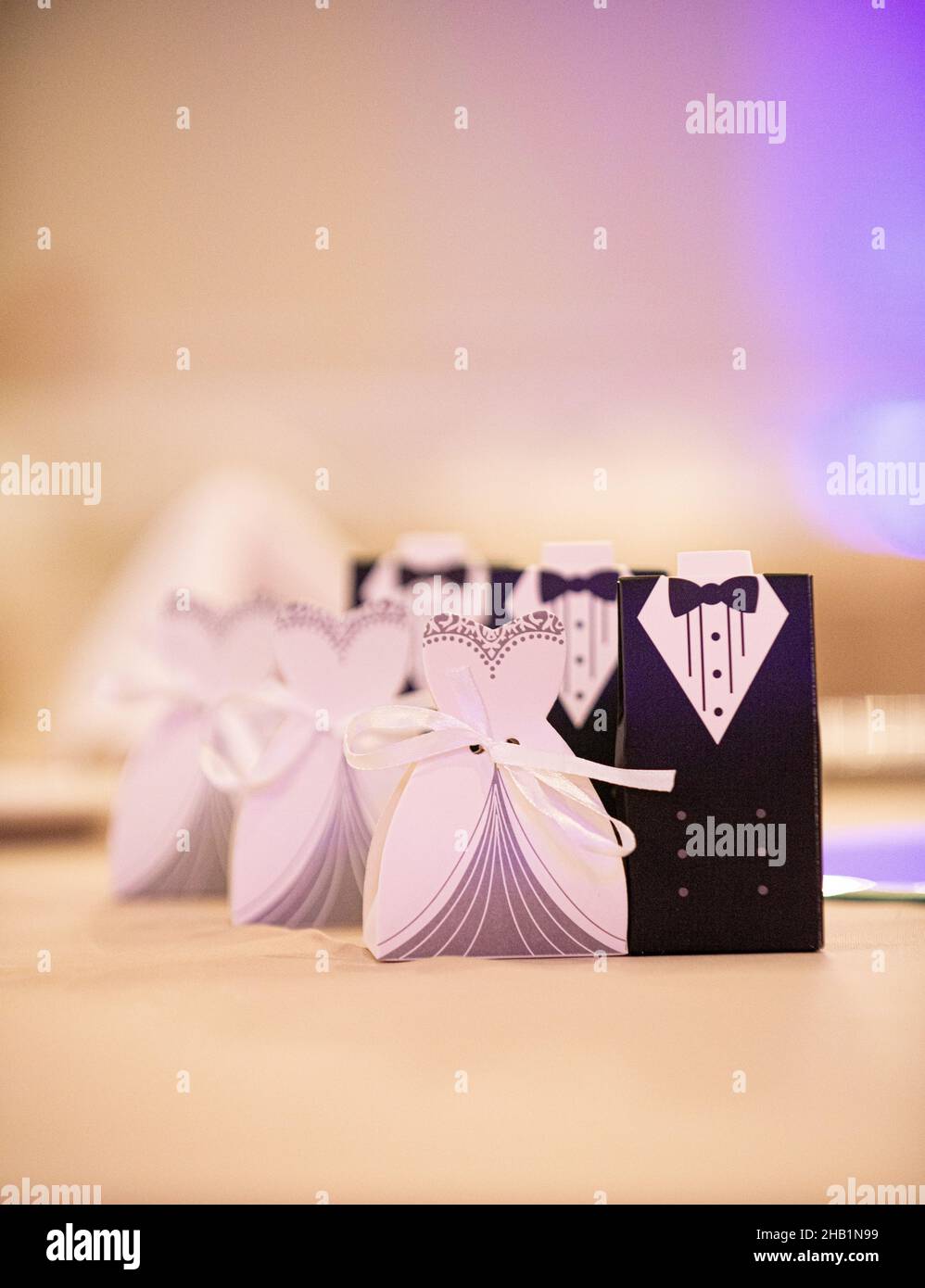 goodies filled tuxedos guest gift centerpieces at wedding reception ...