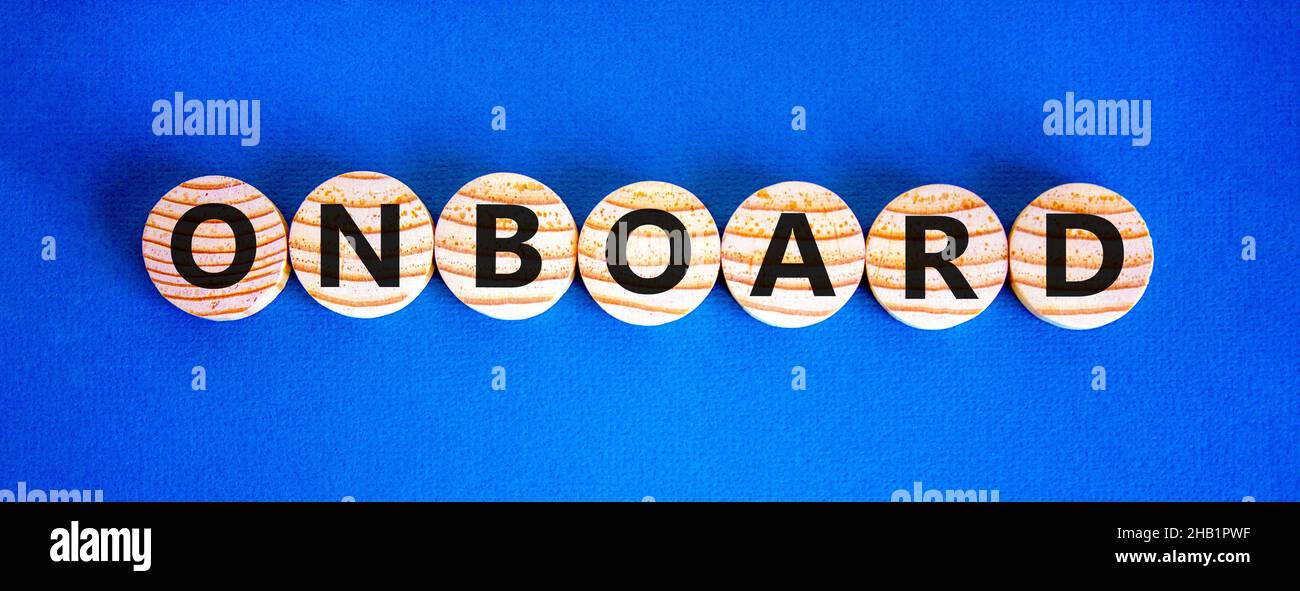 Onboard and onboarding symbol. The concept word Onboard on wooden ...