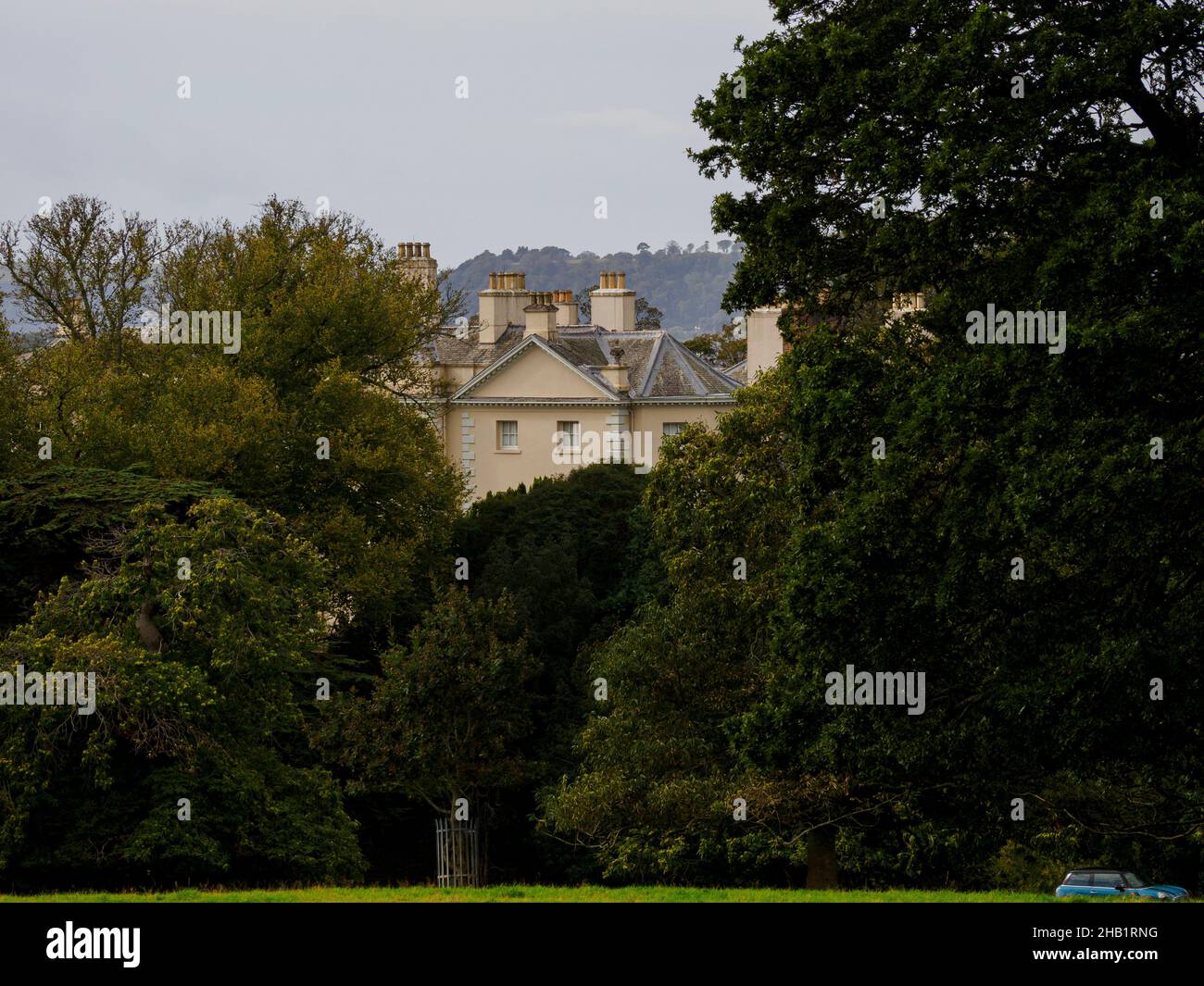 Saltram House behind trees, Plymouth, Devon, UK Stock Photo - Alamy