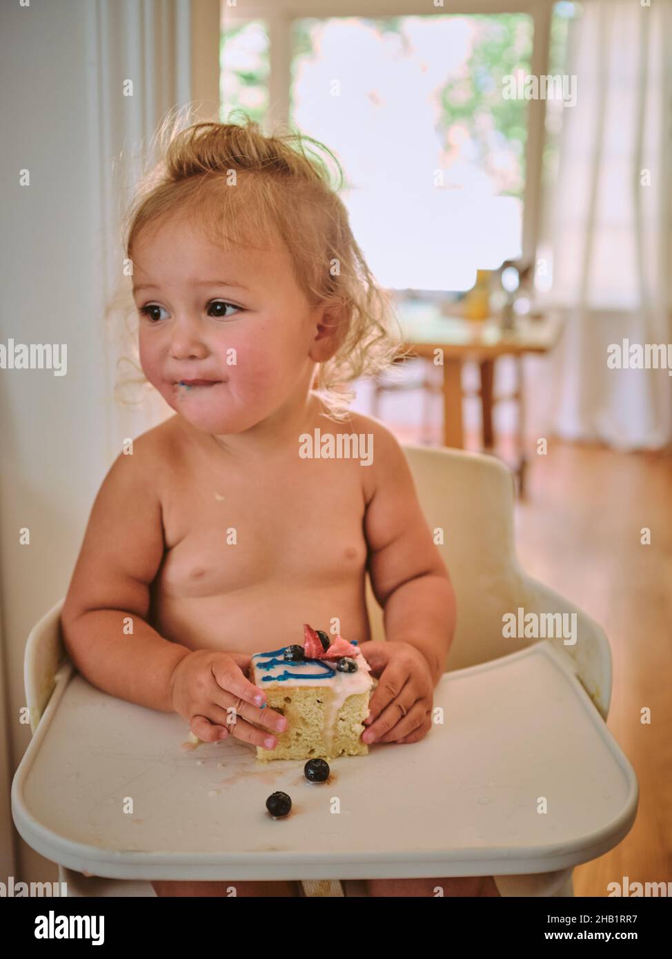 Girl by a high chair hi-res stock photography and images - Alamy