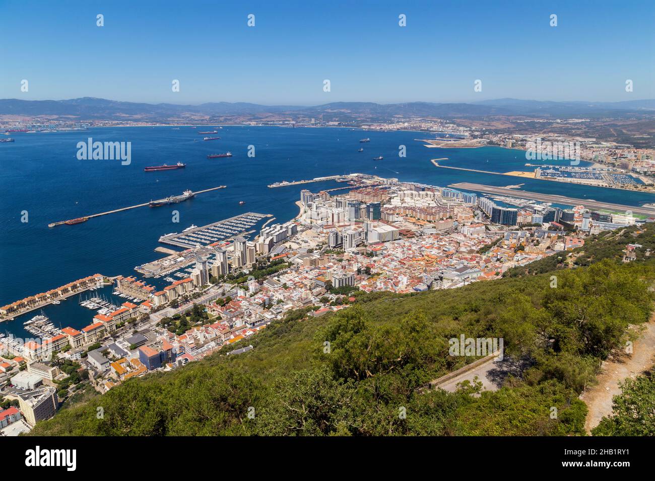 The town and harbour of Gibraltar viewed from up the Rock. Gibraltar is ...