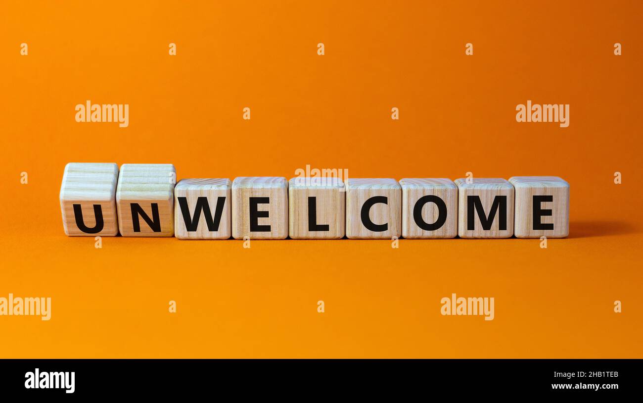 Welcome or unwelcome symbol. Turned wooden cubes and changed the word ...
