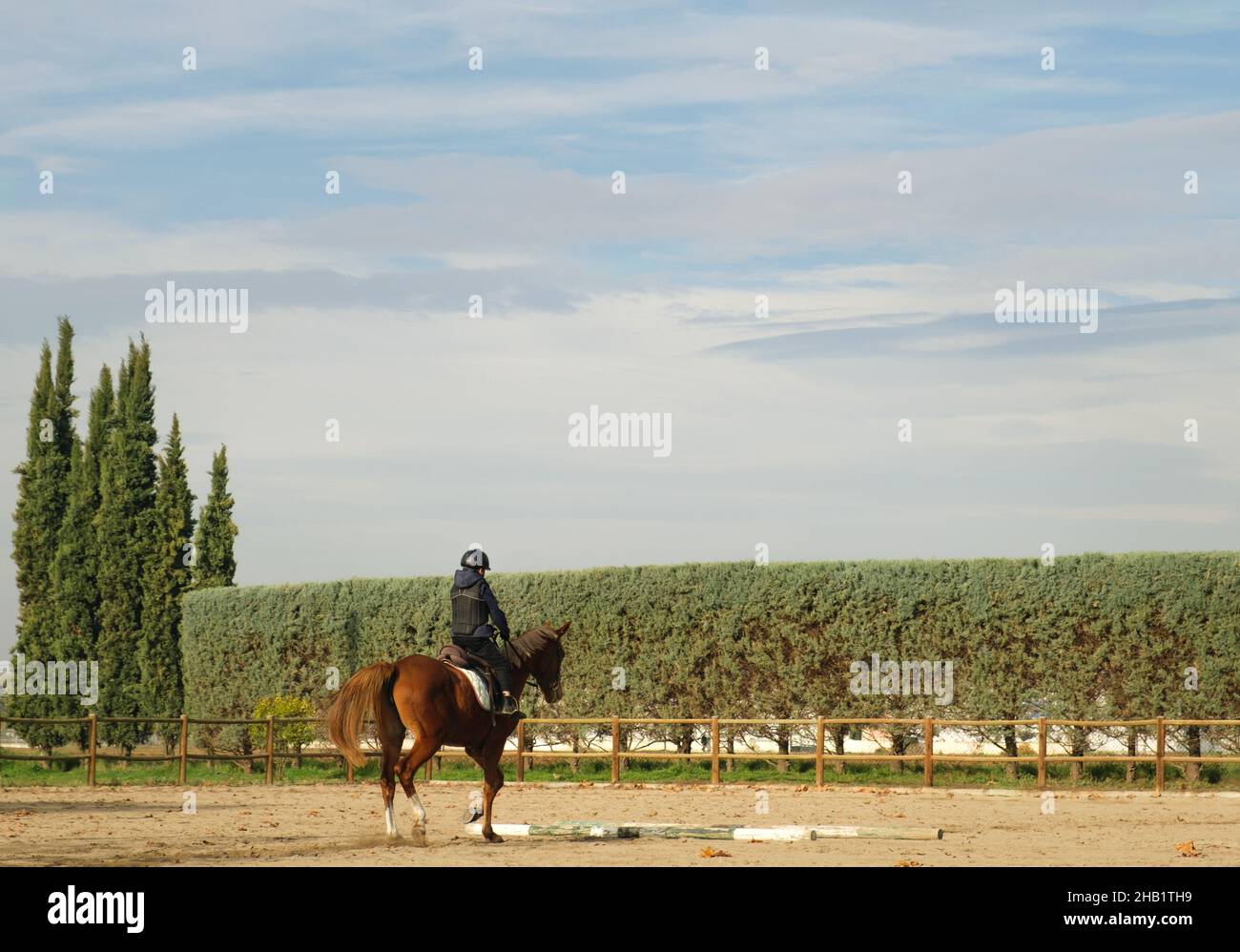 Kid leaning horseback riding at ranch Stock Photo - Alamy