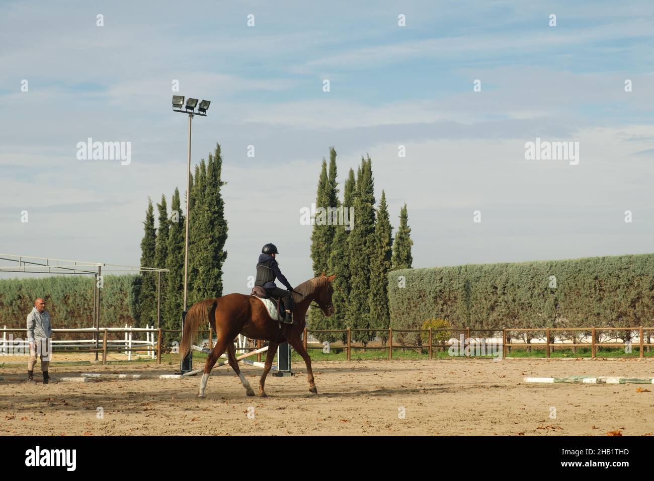 Kid leaning horseback riding at ranch Stock Photo - Alamy
