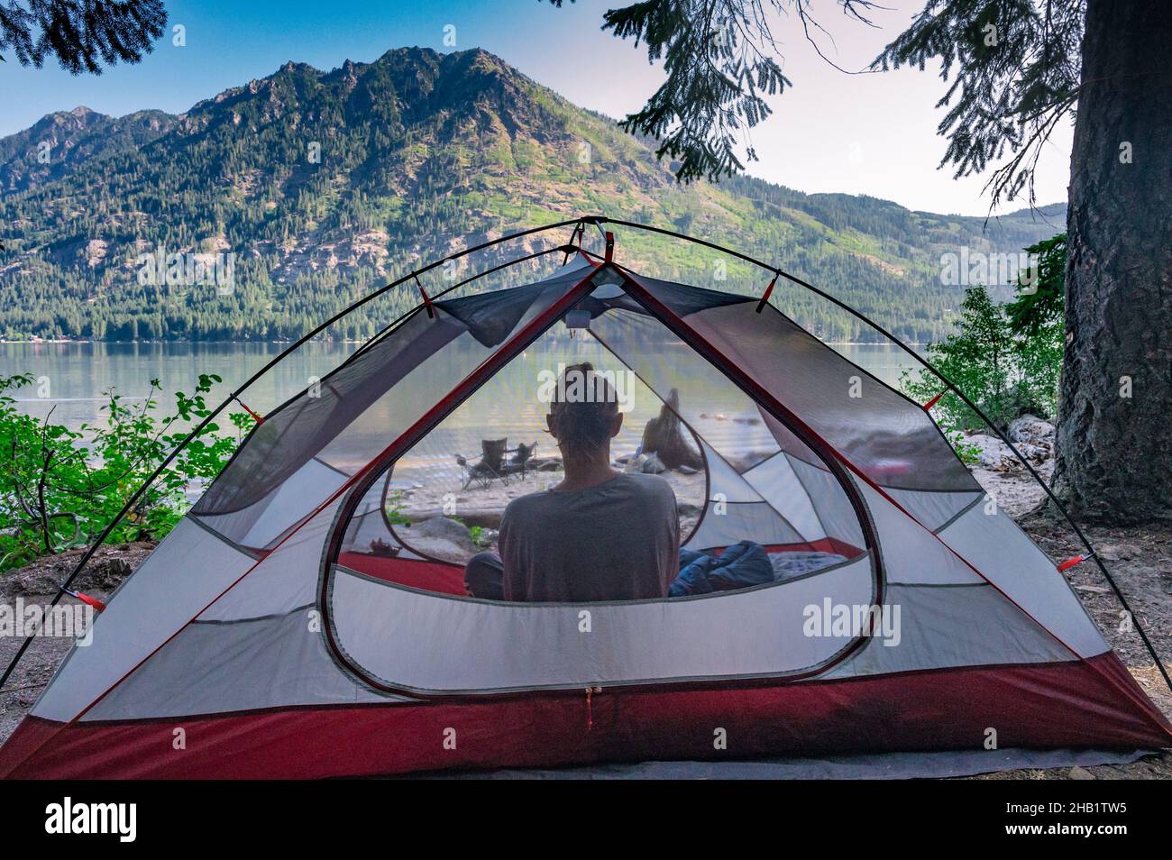 Person sitting inside tent hi-res stock photography and images - Alamy