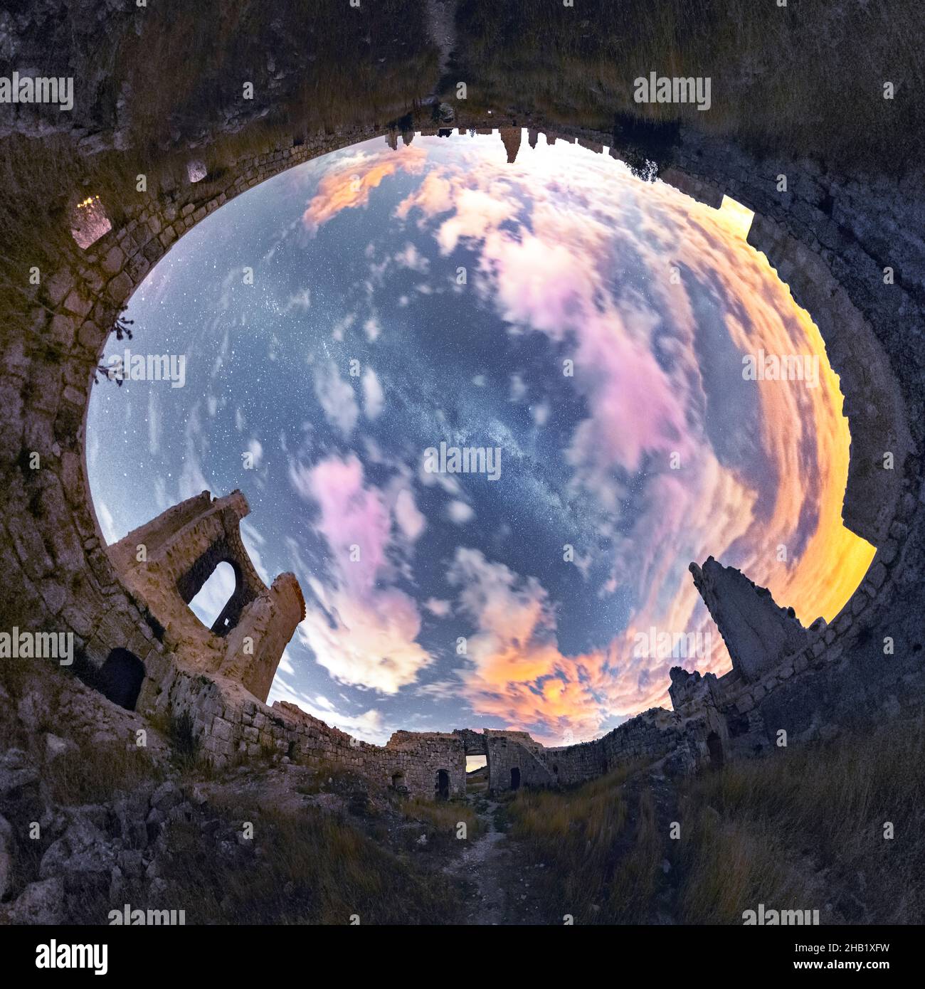 Medieval castle under stars cloudy sky, fish eye view Stock Photo - Alamy