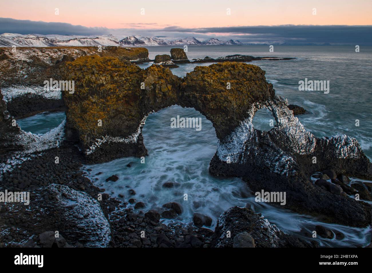 the famous rock arch in Arnastapi on the Snaefellsnes peninsula Stock ...