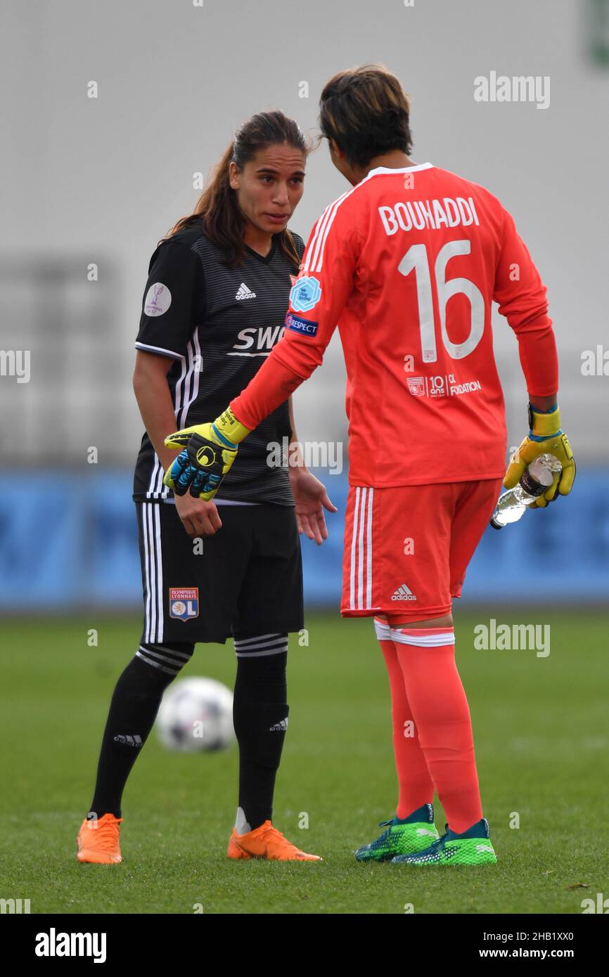 Lyon’s Amel Majri speaks with Lyon’s goalkeeper Sarah Boudhaddi Stock ...