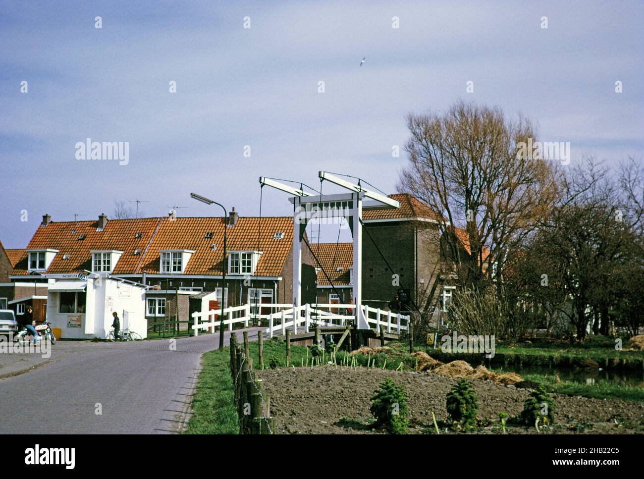 Bascule bridge and traditional village homes at Marken, Netherlands ...