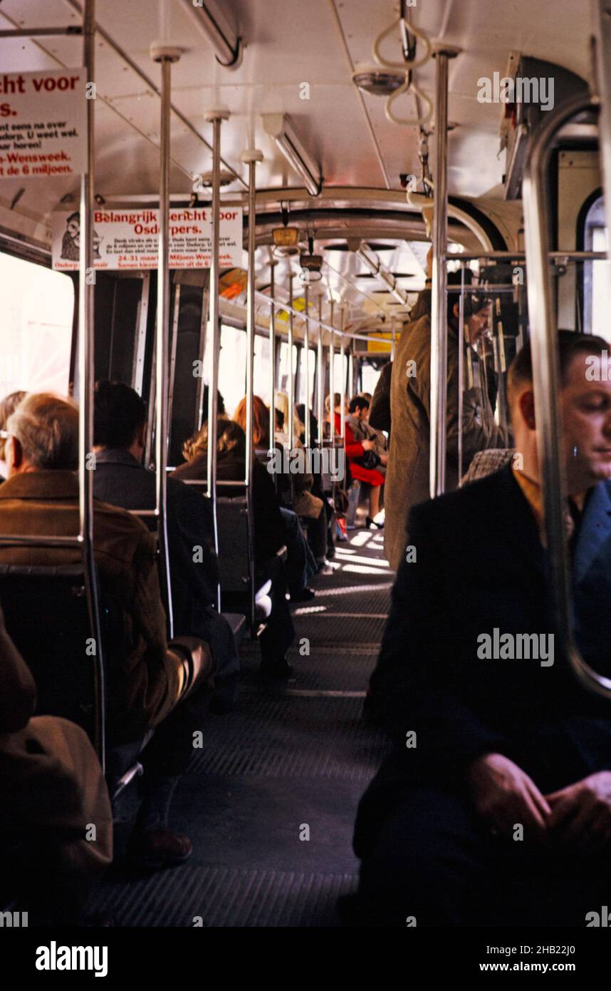 Passengers sitting inside a streetcar tram in Amsterdam, Netherlands ...