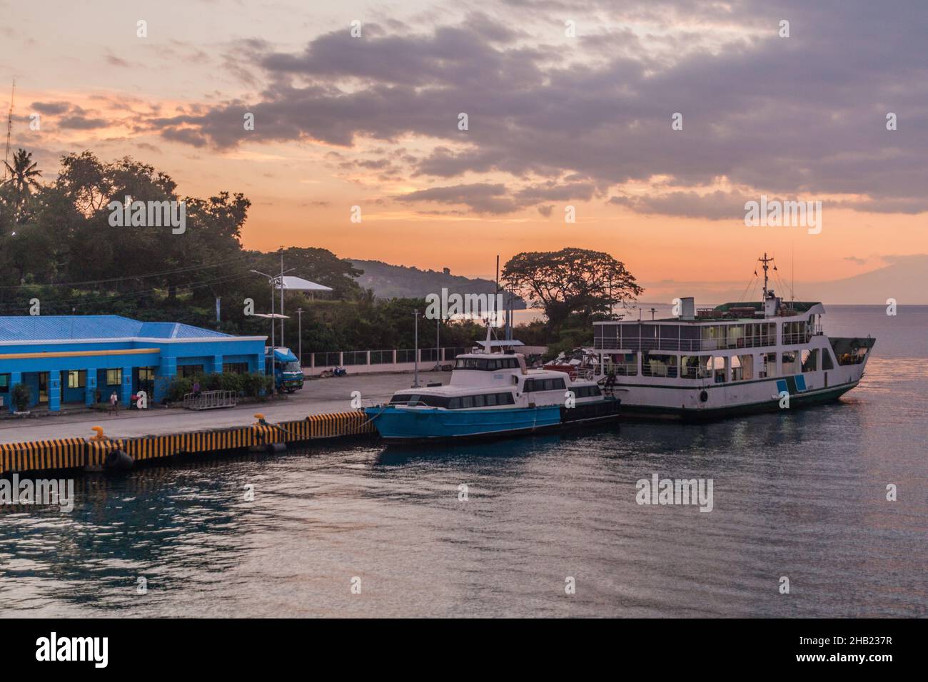 Sunset view of the Larena Ferry Terminal on Siquijor island ...