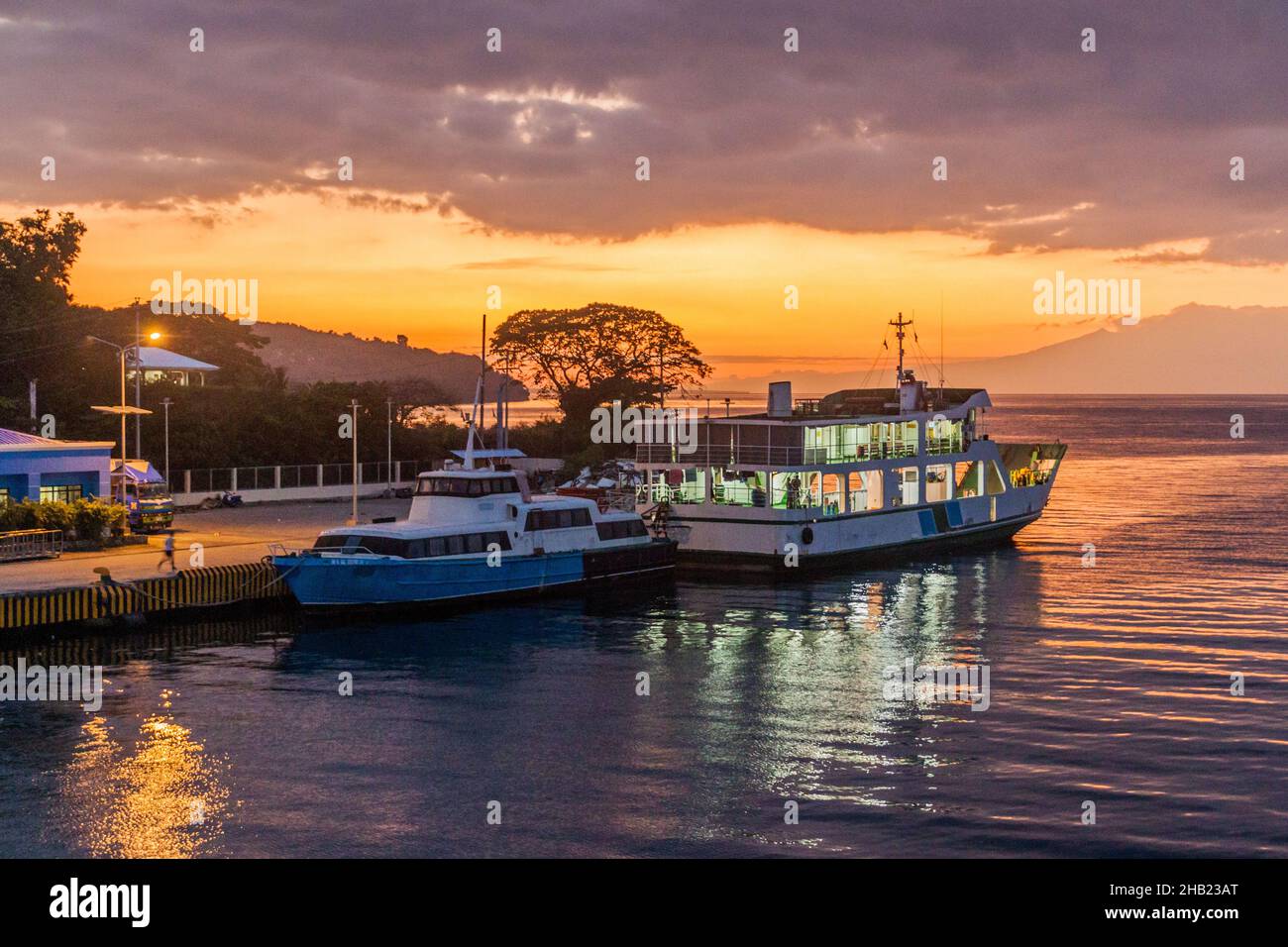 Sunset view of the Larena Ferry Terminal on Siquijor island ...
