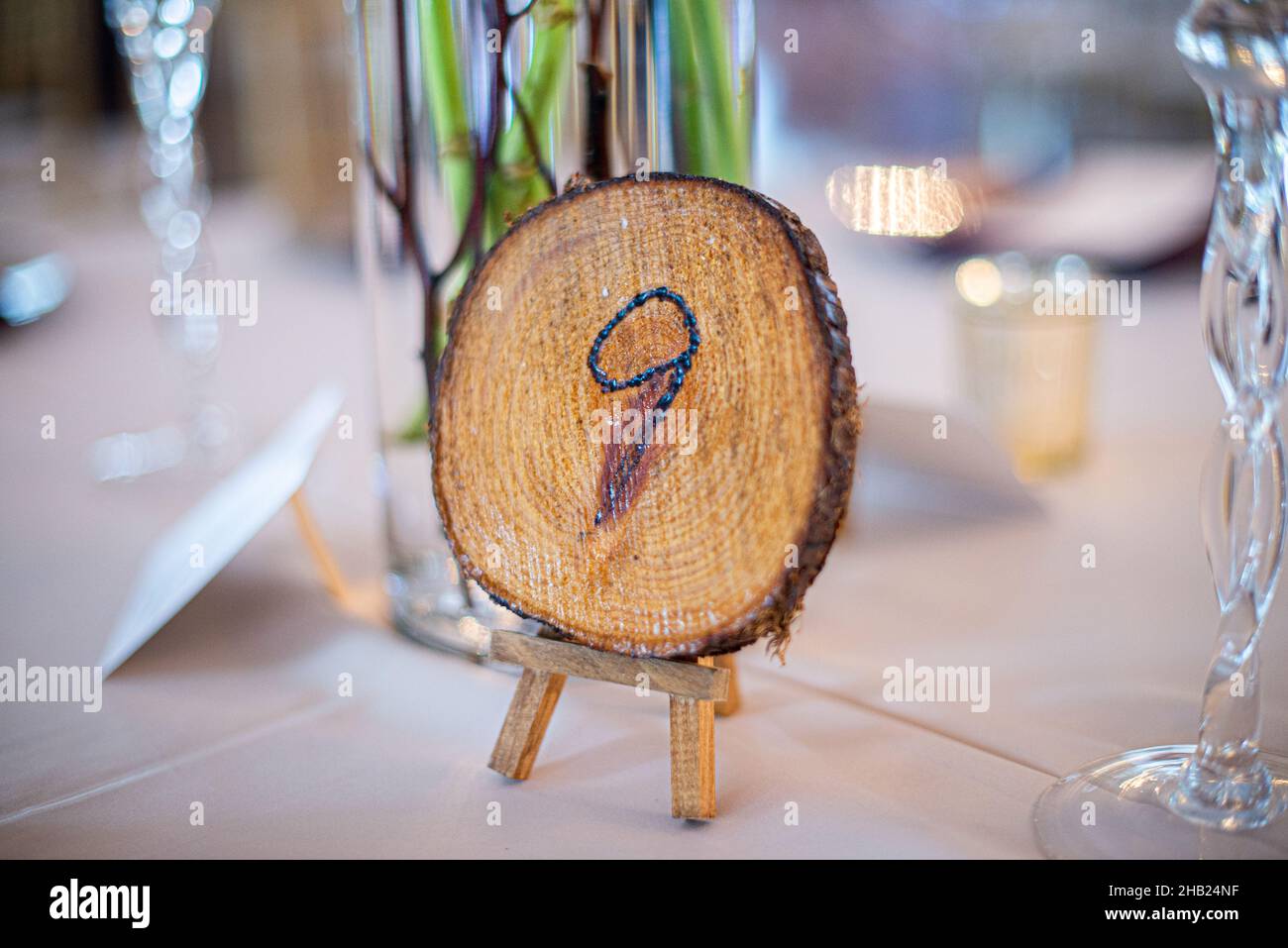Wood stump with number nine engraved on it table place indicator at ...