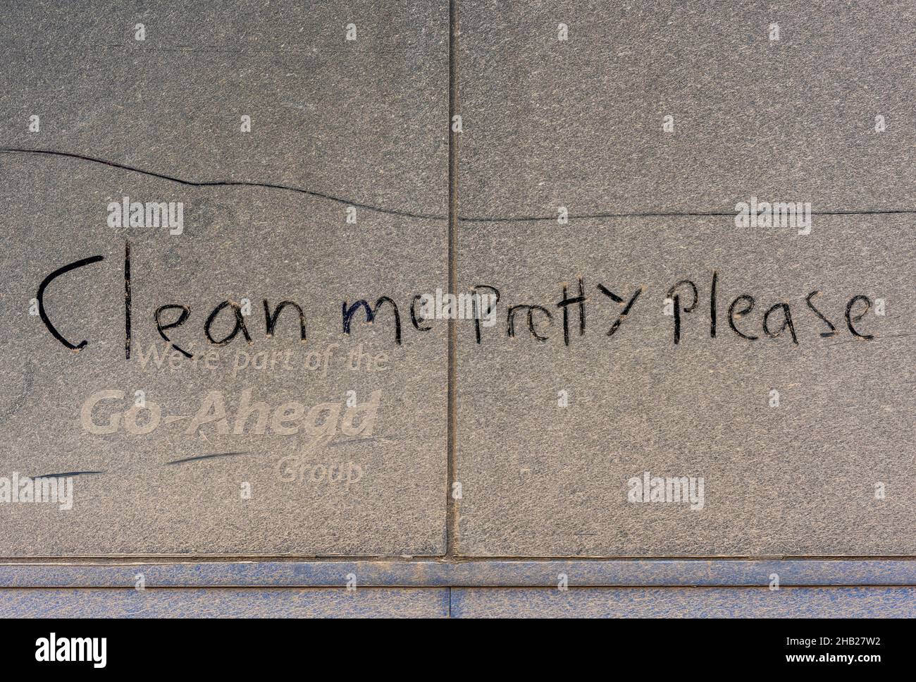 clean me please written in dirt on the side of a blue star bus in the ...