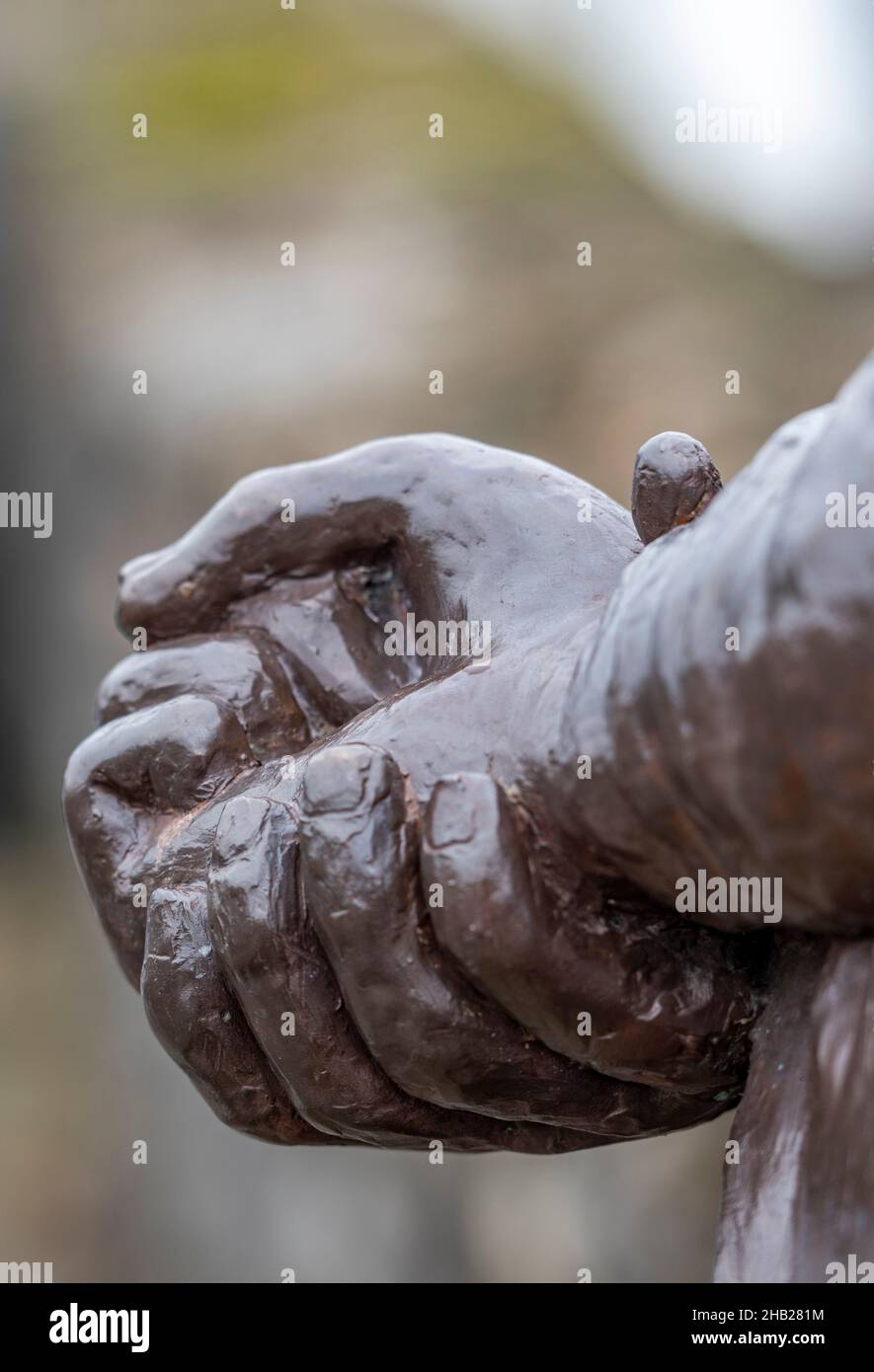 clasped hands, hands clasped behind back, sculpture of clasped hands ...