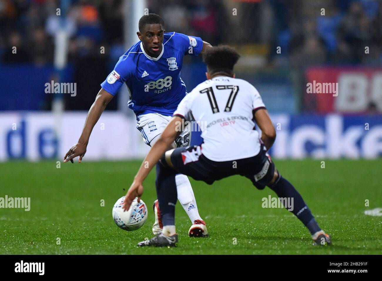 Birmingham City's Wes Harding goes past Bolton Wanderers' Derik Osede ...