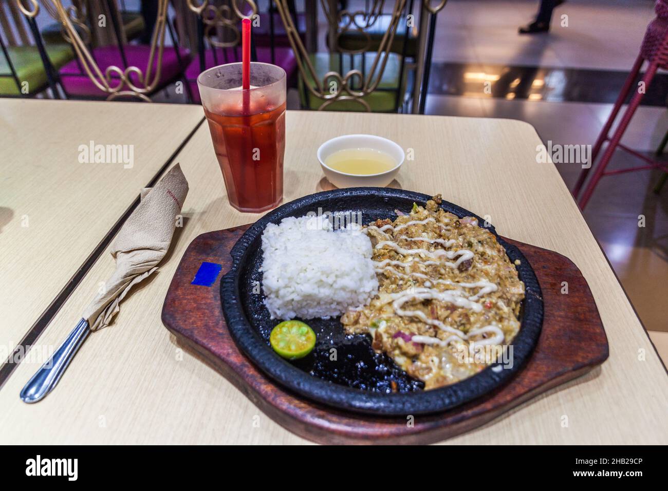 Sizzling sisig, typical meal of Philippines Stock Photo - Alamy