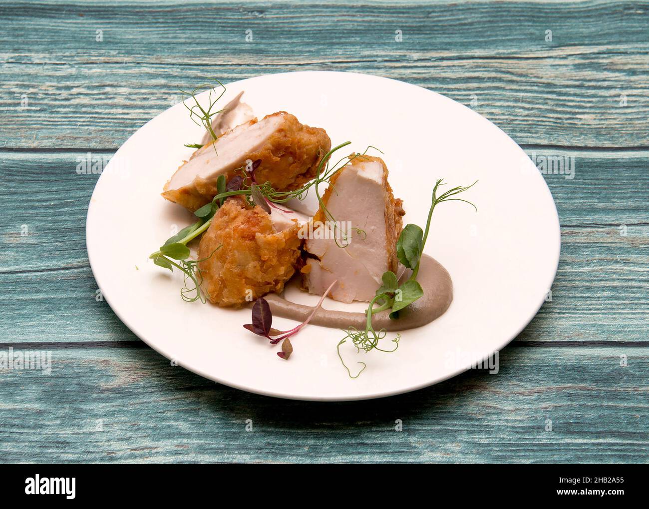 Pollo con setas..Spanish Tapas dishes Stock Photo - Alamy