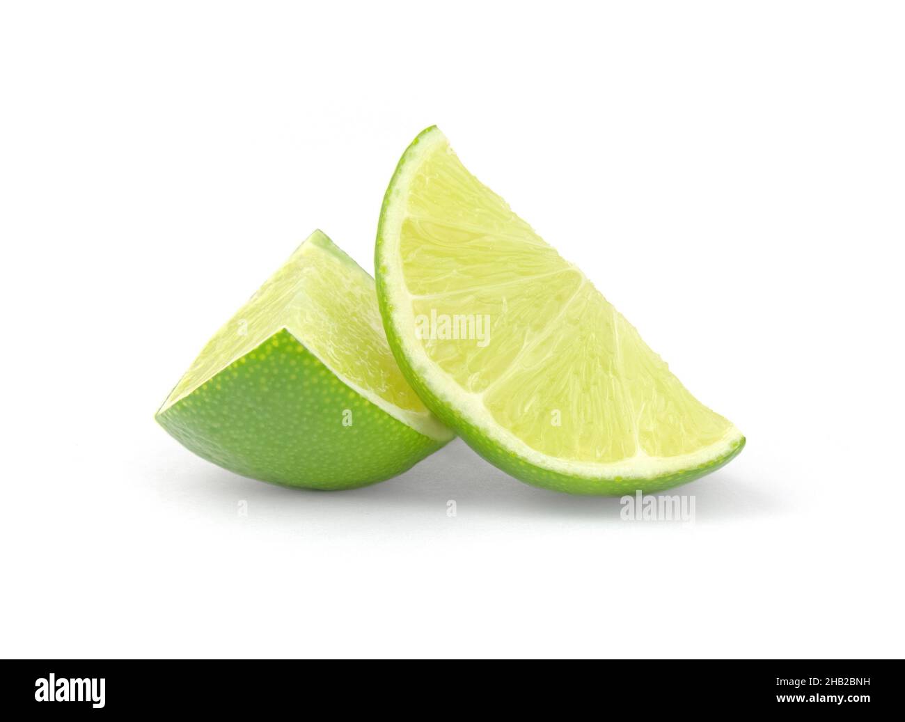 fresh lime wedge isolated on a white background Stock Photo - Alamy