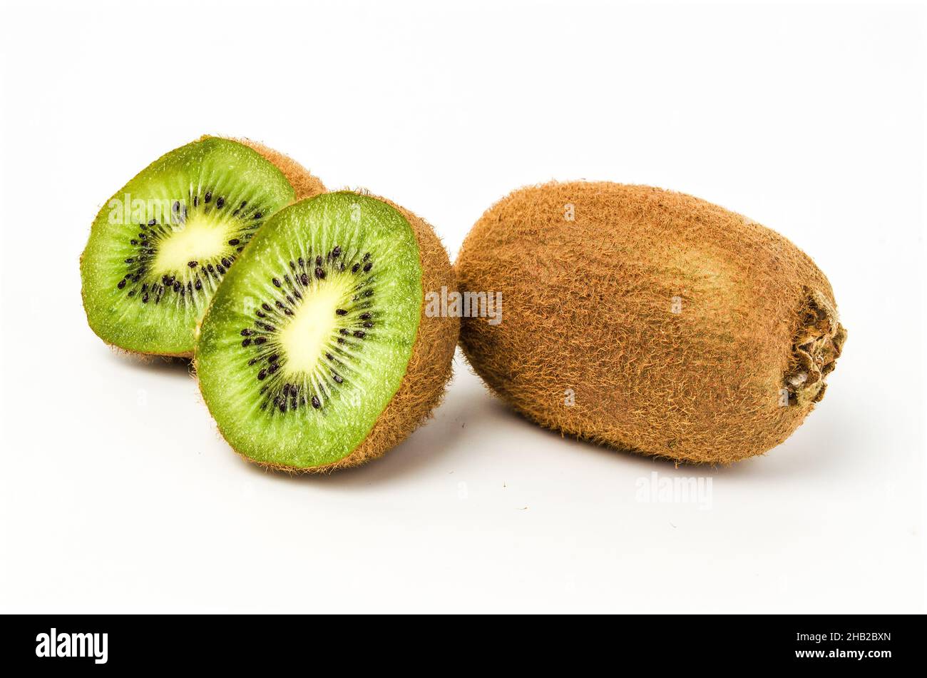 Kiwi fruit sliced segments isolated on white background Stock Photo - Alamy