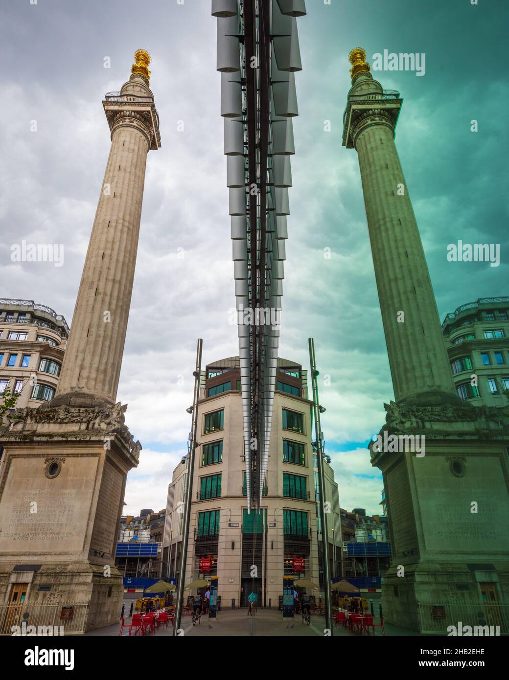 The Great Fire of London Memorial reflecting in the glass of modern ...