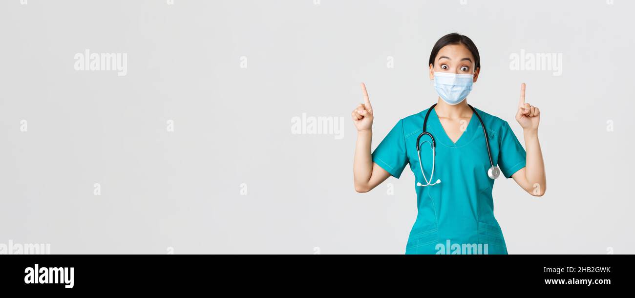 Covid-19, coronavirus disease, healthcare workers concept. Intrigued ...