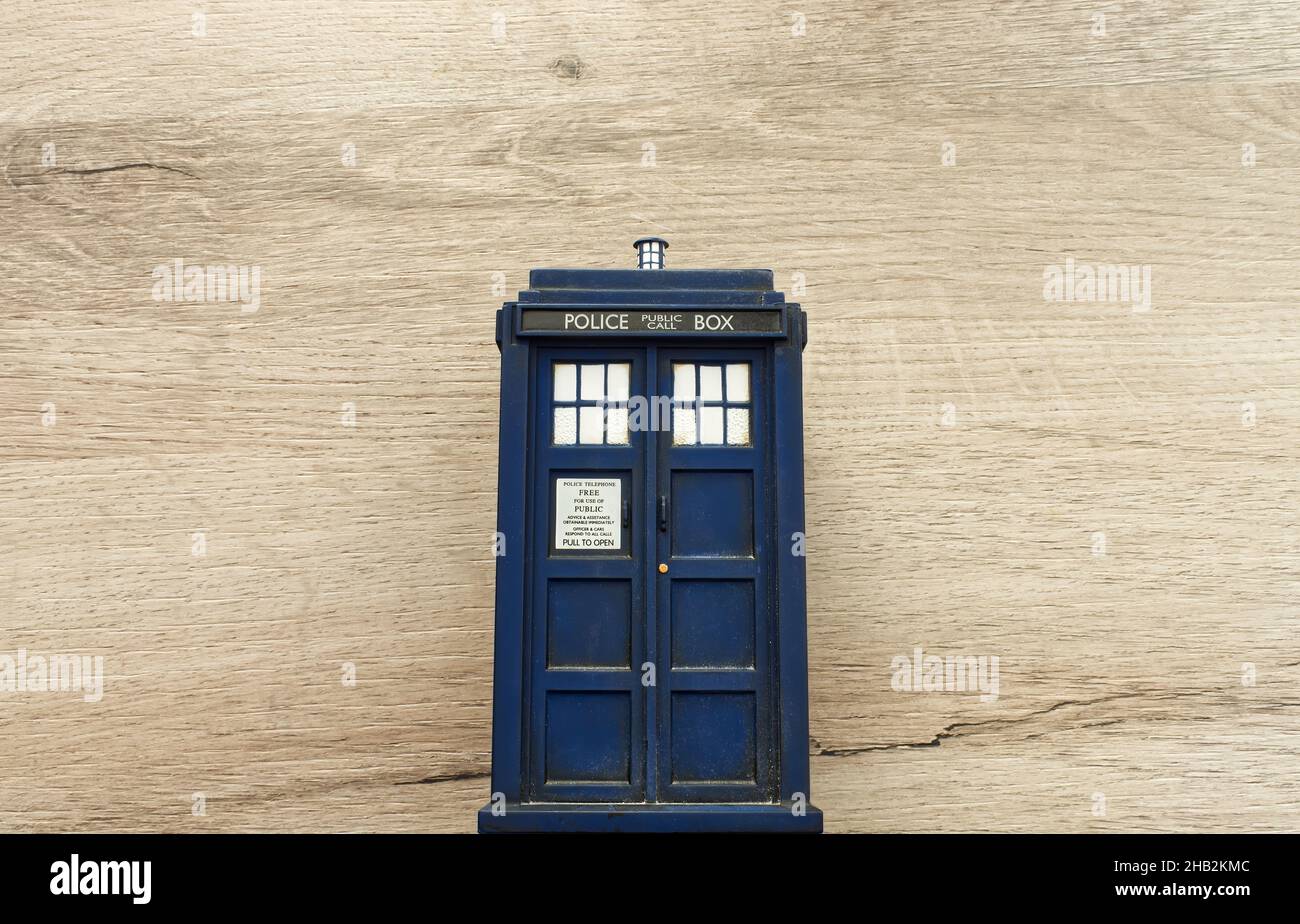 Police call box isolated on wooden background. Tardis from Doctor Who ...