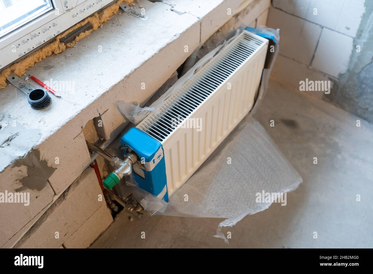 Repair heating radiator close-up. House Renovation Stock Photo - Alamy