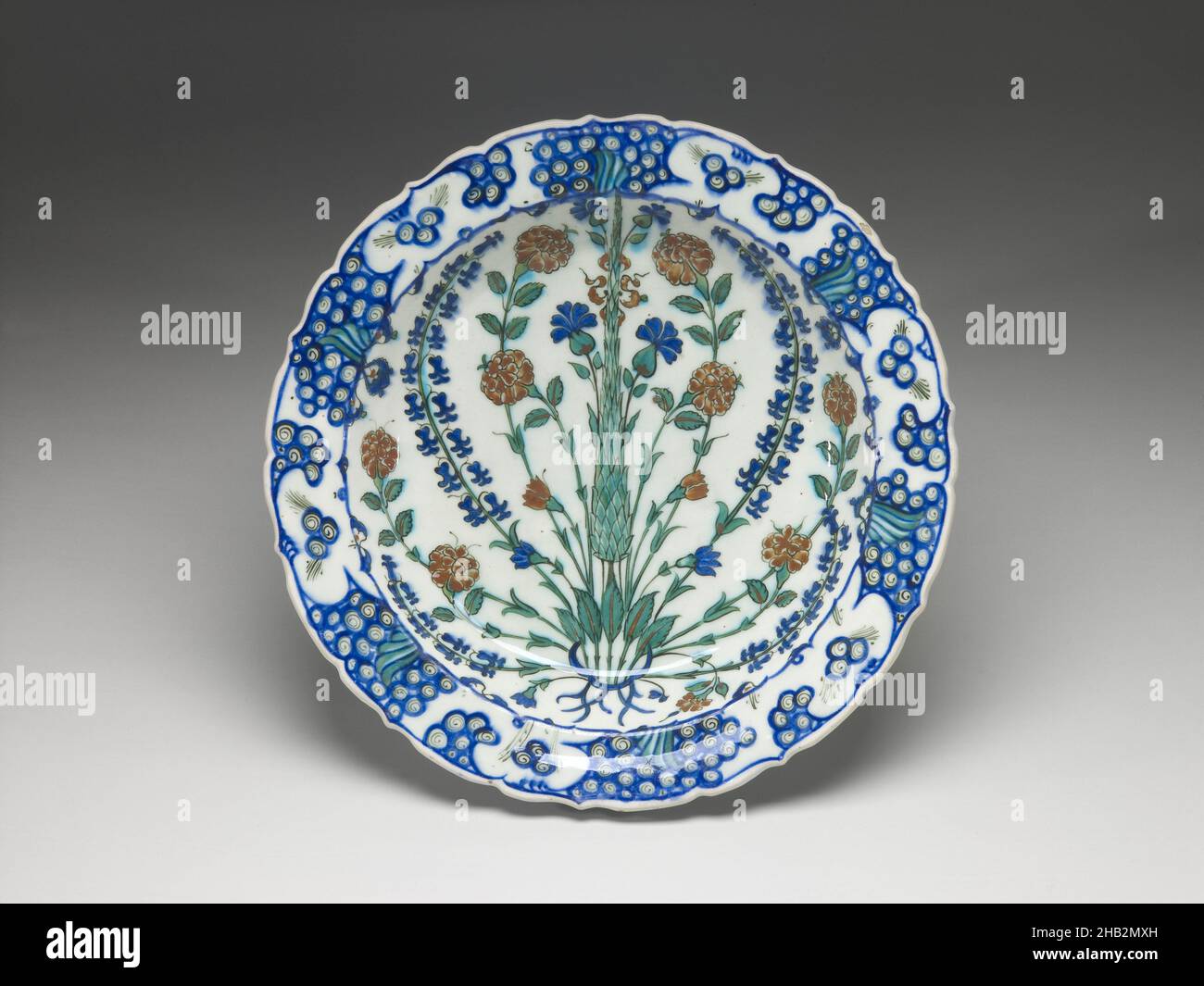 Dish with Foliated Rim and Design of Cypress Tree with Flowering Plants ...