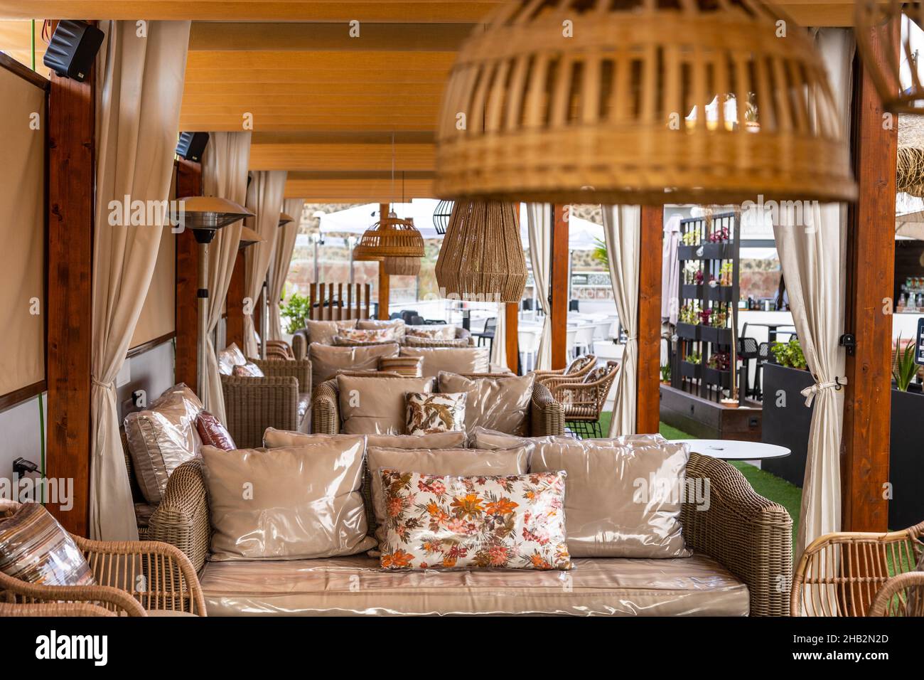 Modern interior of an open-air cafe Stock Photo - Alamy