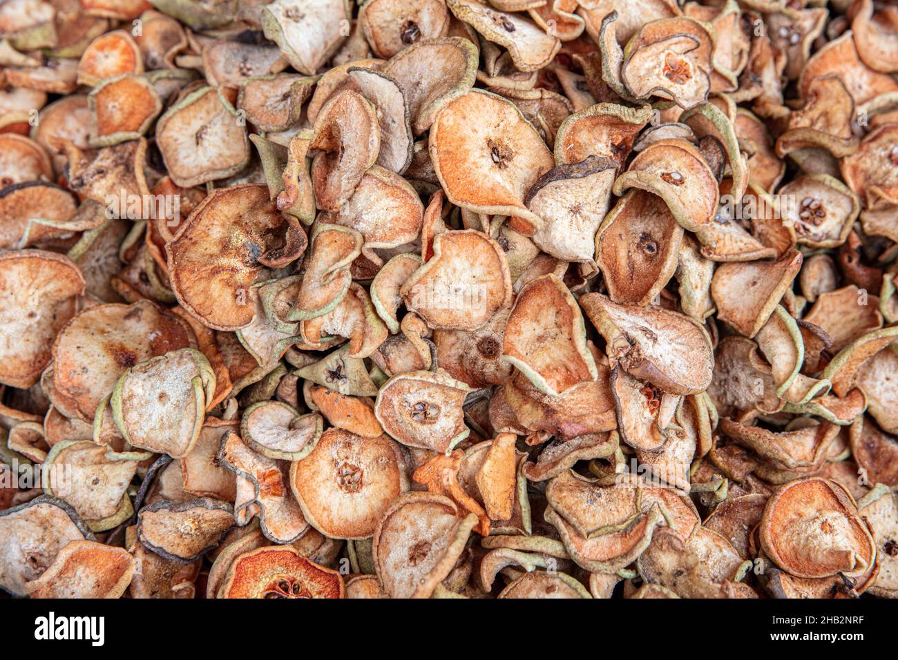 Dried Sliced Pears in Bulk. Dry fruit texture background Stock Photo ...